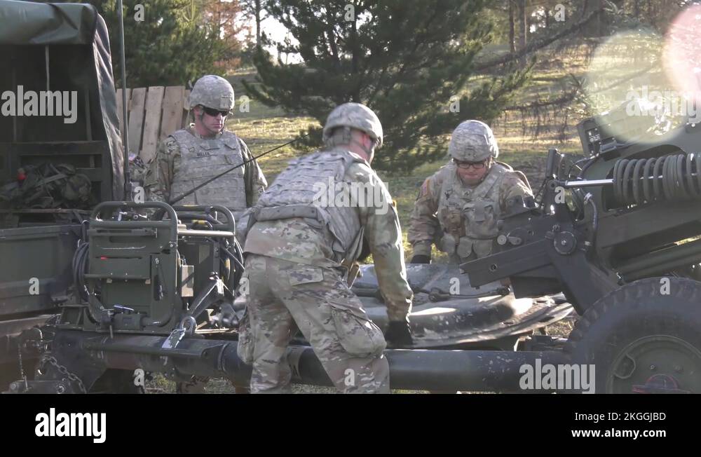 Army National Guard soldiers assembling Howitzer cannon Stock Video ...