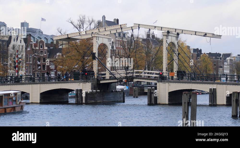 Amsterdam: Boat and Magere Brug the Skinny Bridge over the Amstel river ...