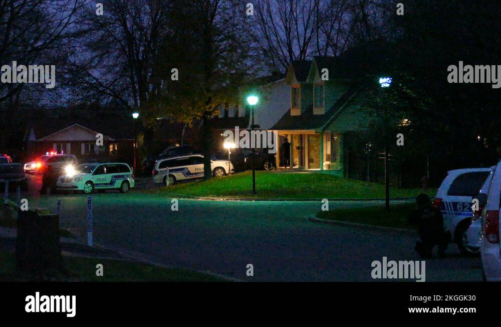 Tactical cop giving instructions over PA to suspect with hands up ...