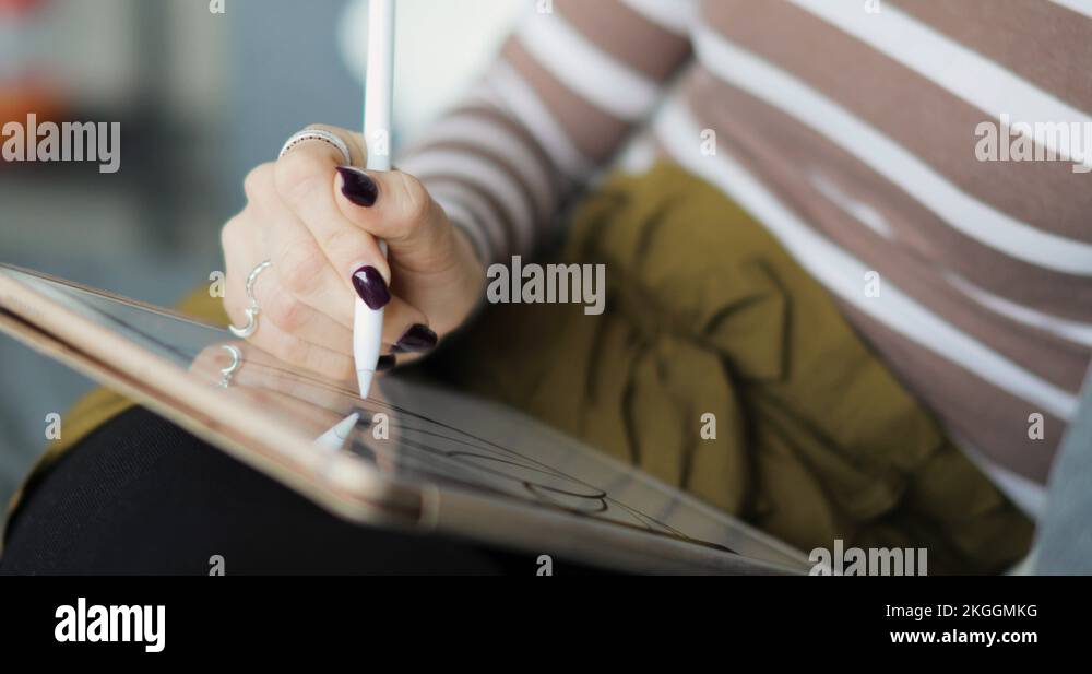 working with interactive pen display. Drawing on a graphics tablet ...