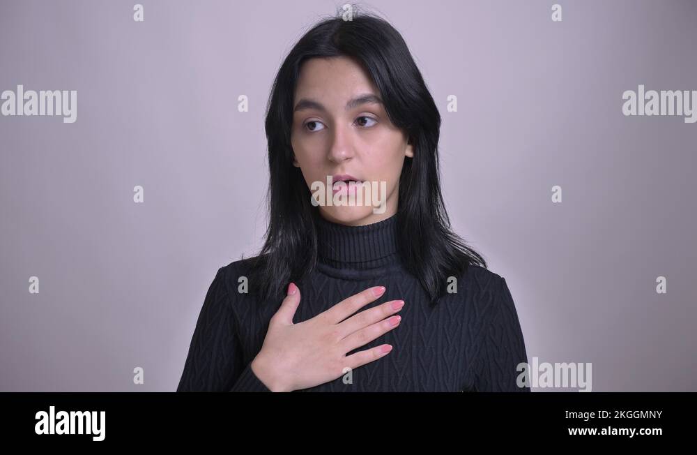 Closeup shoot of young beautiful caucasian female being embarrassed and ...