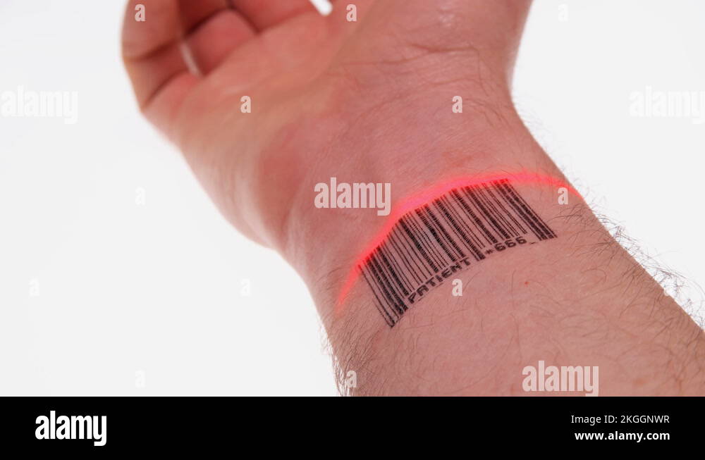 the scanner scans the wrist of a person with a barcode labeled patient ...