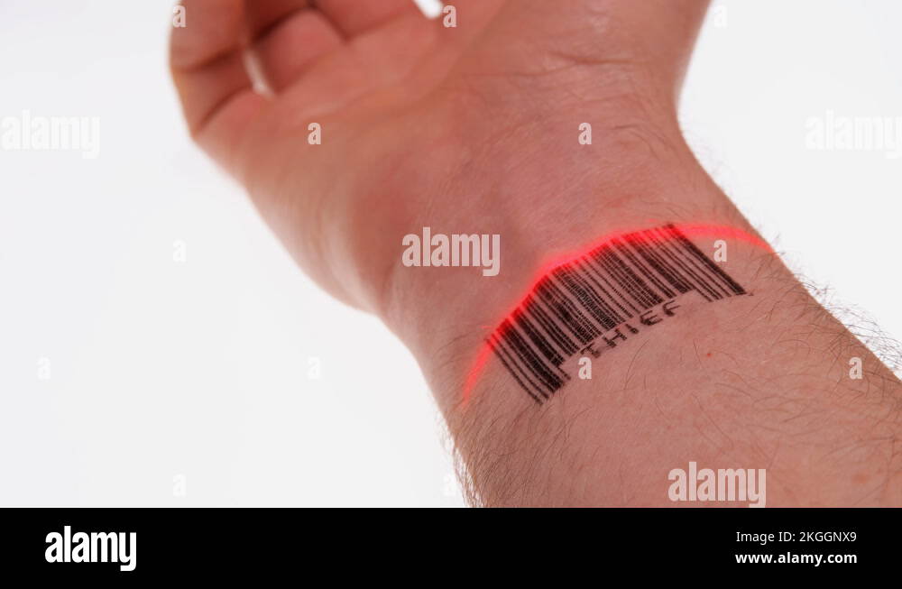 the scanner scans the wrist of a person with a barcode labeled thief ...