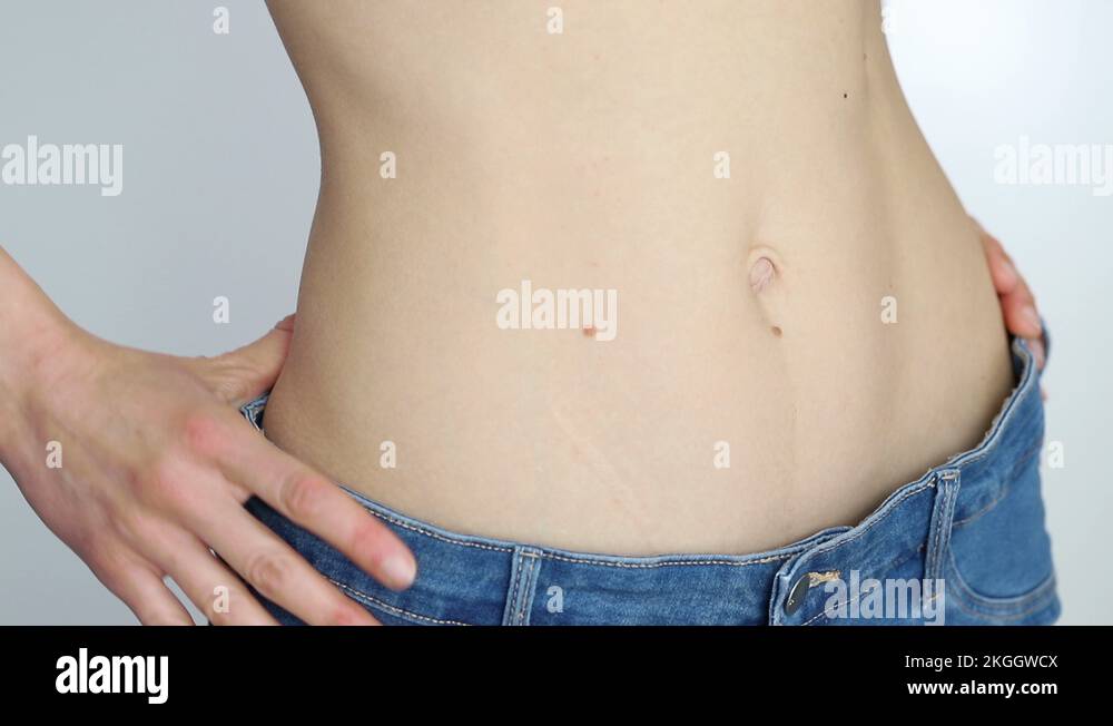 Girl showing her belly Stock Videos & Footage - HD and 4K Video Clips ...