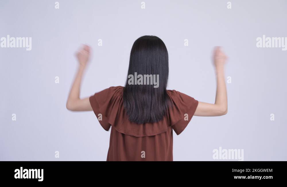 Back view woman raised fist Stock Videos & Footage - HD and 4K Video ...