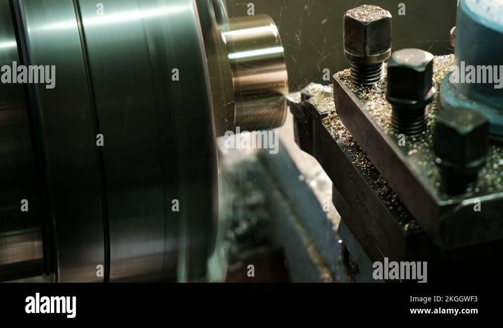 Facing operation of a brass blank on turning machine with cutting tool ...