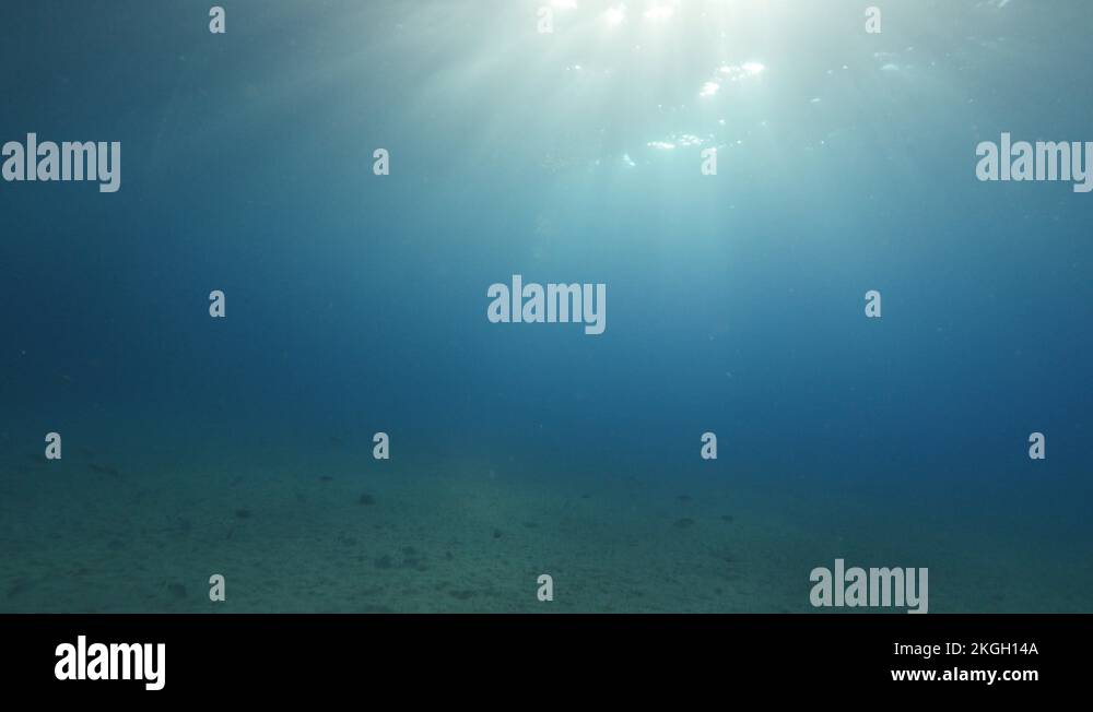 sun shine sun beam sun rays underwater surface of sea waves Stock Video Footage - Alamy