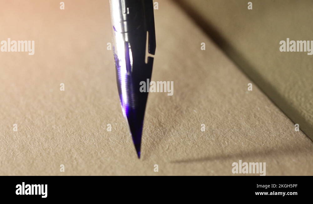 Calligraphy swirl process. Writing flourishes on calligraphy paper with ...