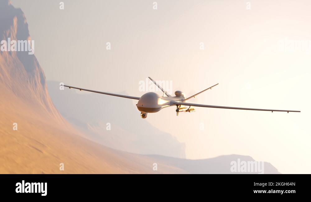Armed military drone (UAV) flying smoothly over a vast desert shooting ...
