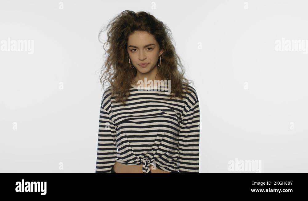 Shock woman touching face in studio. Portrait of surprised woman ...