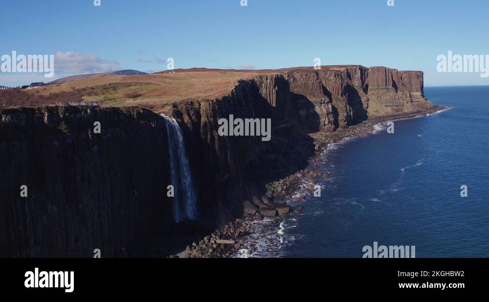 Kilt Rock, Skye, Scotland in sunshine, showing height of cliffs drone ...