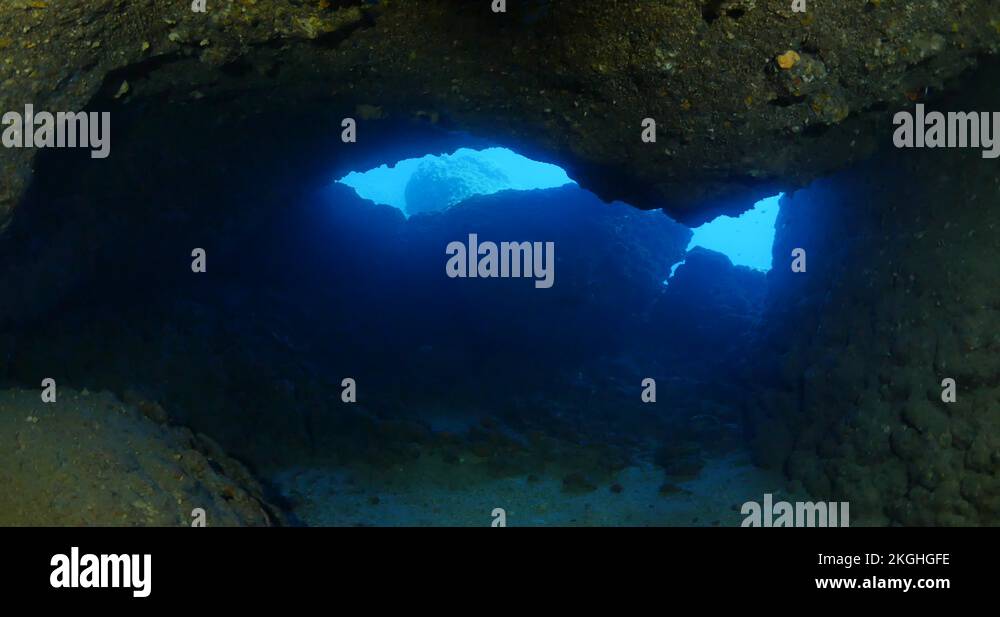 light underwater sun shine rays and beams dark cave deep water for ...