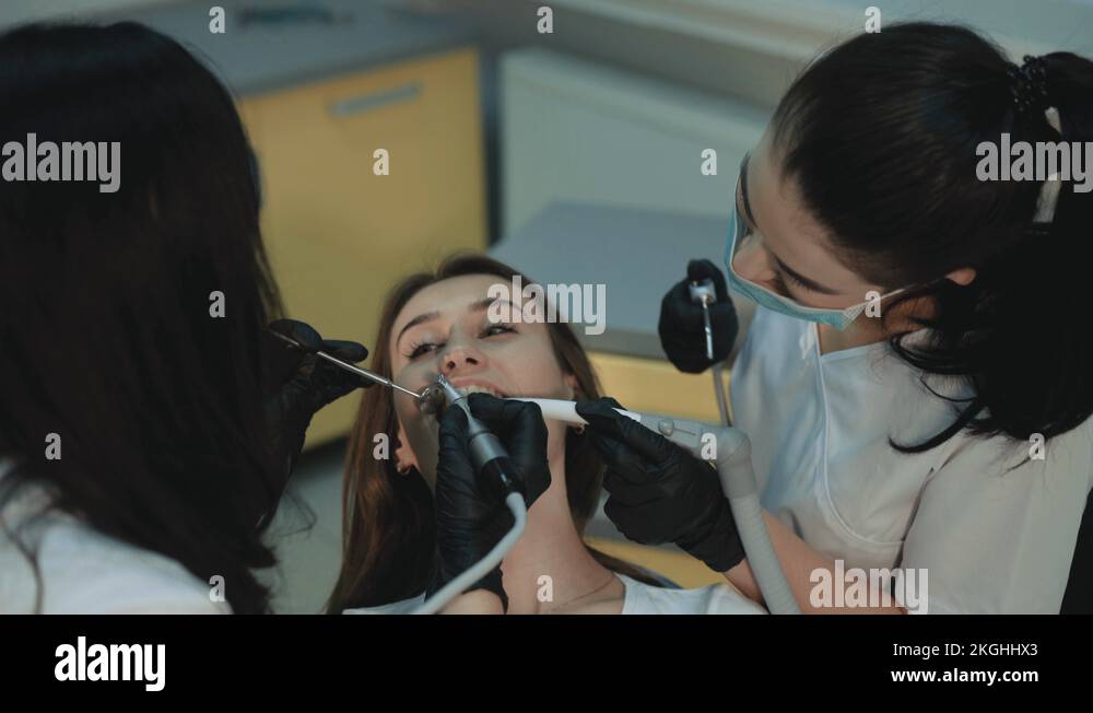 Pretty girl lying on dental chair on treatment. 4K Stock Video Footage ...