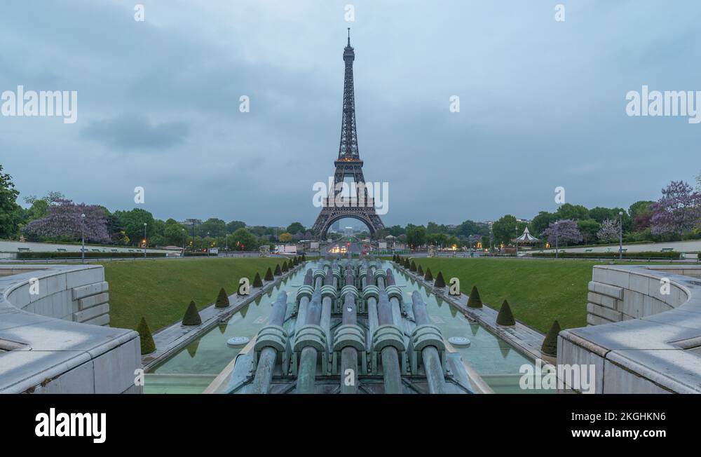 Paris France time lapse 4K, city skyline timelapse at Eiffel Tower ...