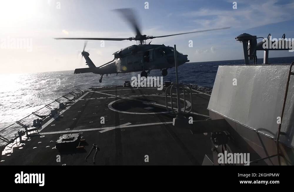 MH-60 Seahawk helicopter landing aboard USS Curtis Wilbur Stock Video ...