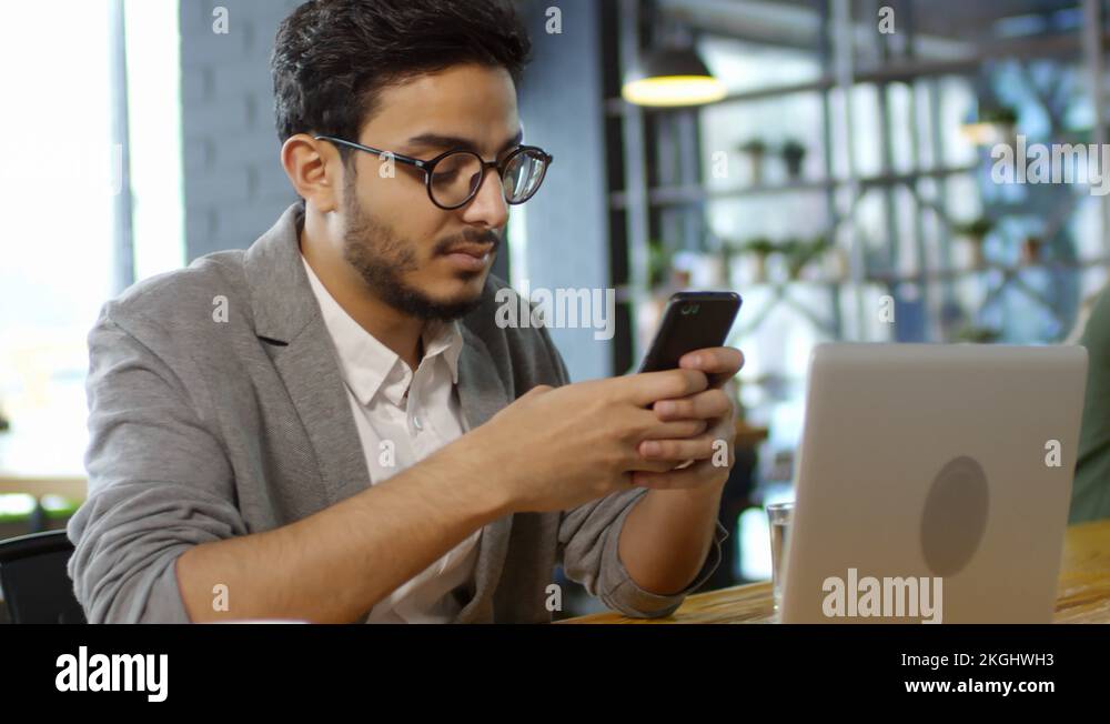 Handsome arab man using Stock Videos & Footage - HD and 4K Video Clips ...