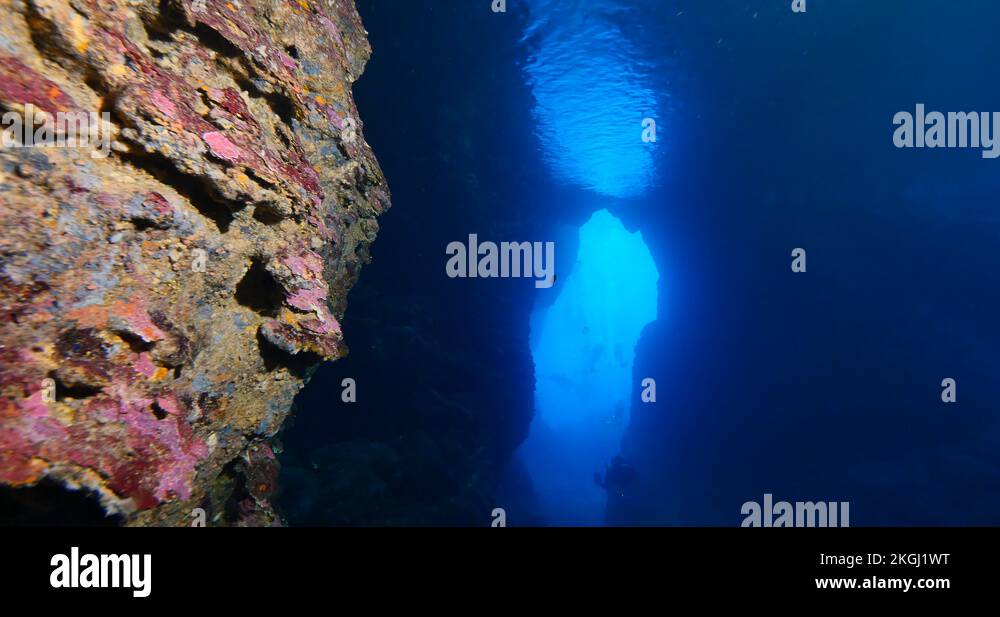 light underwater sun shine rays and beams dark cave deep water for ...
