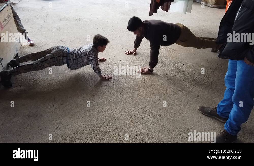 Boy doing push ups Stock Videos & Footage - HD and 4K Video Clips - Alamy