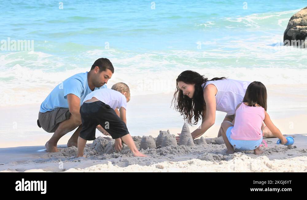 Family building sand castle Stock Videos & Footage - HD and 4K Video ...