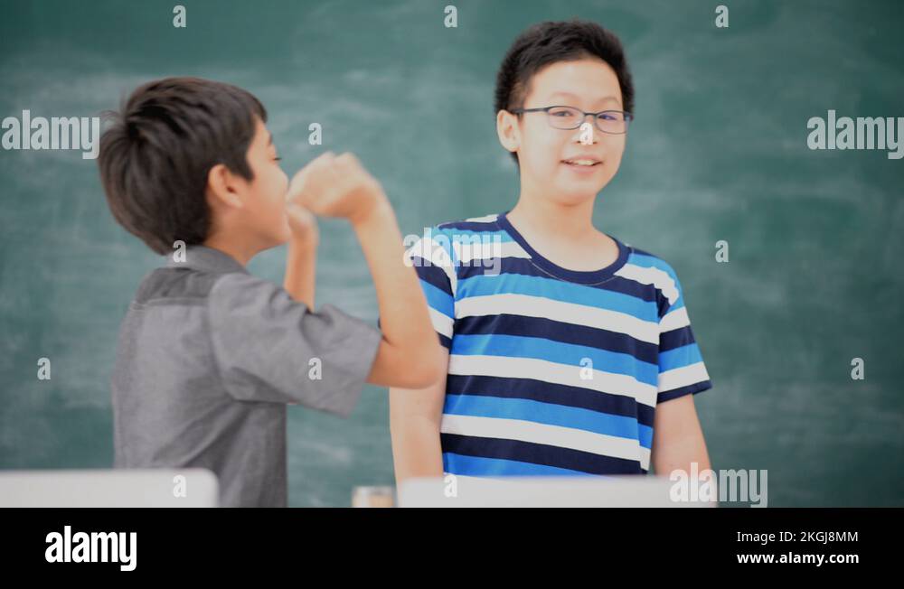 Student boy bullying and fighting in the classroom Stock Video Footage ...
