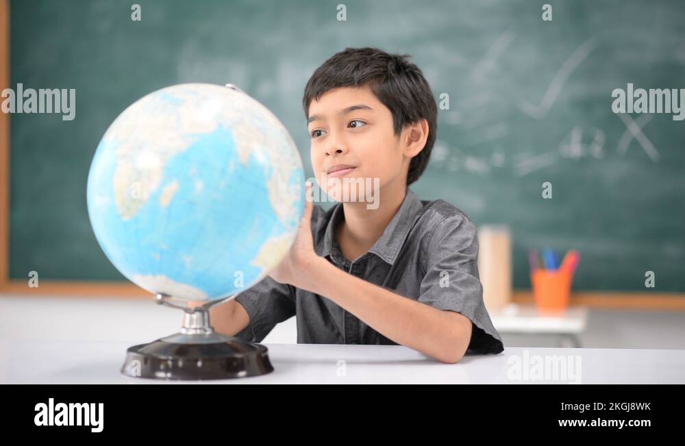 Student boy learning geography earth map in the classroom Stock Video ...