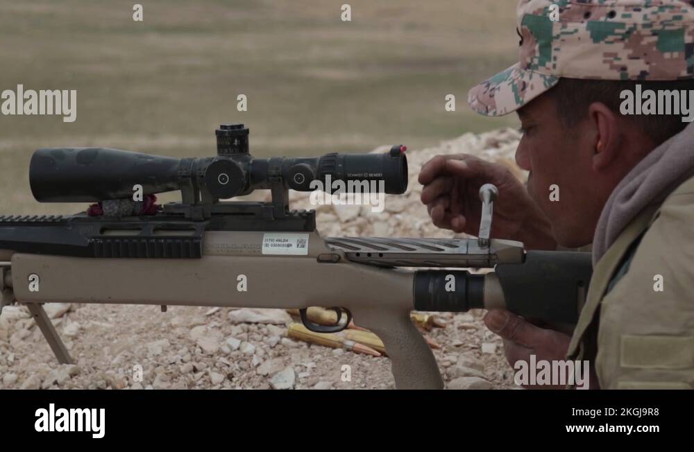 Jordanian sniper loading and cranking rifle Stock Video Footage - Alamy