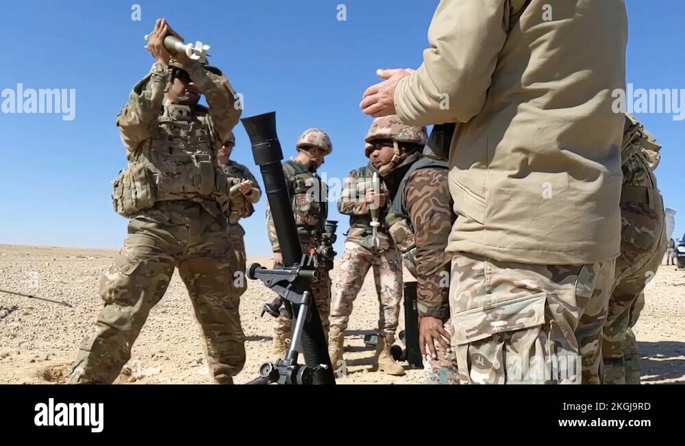 Jordanian Armed Forces soldiers loading and firing mortar rocket ...