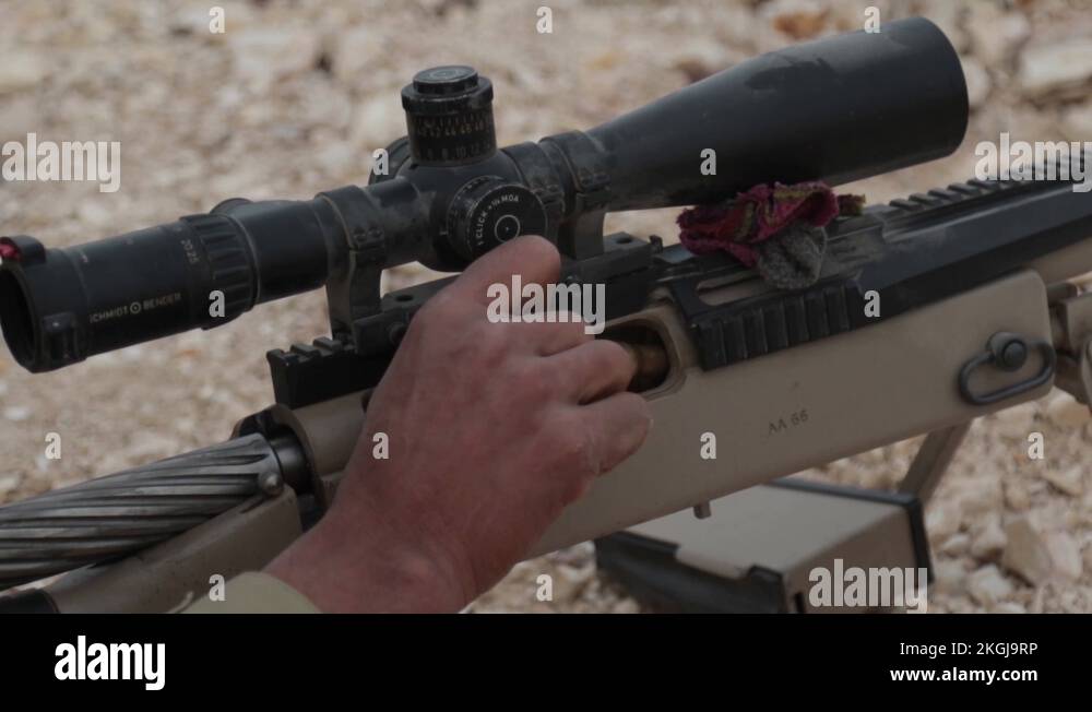 Soldier loading rifle Stock Video Footage - Alamy