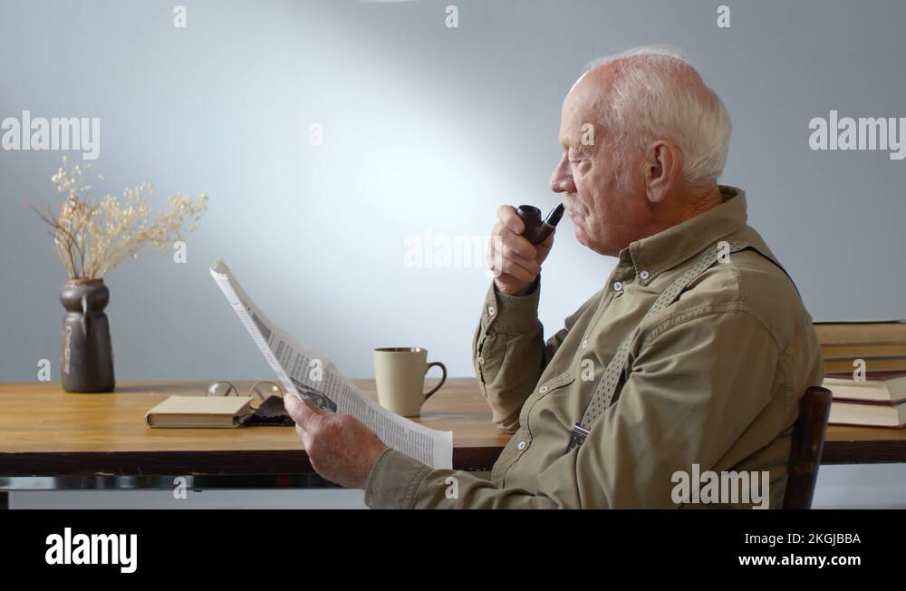 Man reading newspaper smoking pipe Stock Videos & Footage - HD and 4K ...