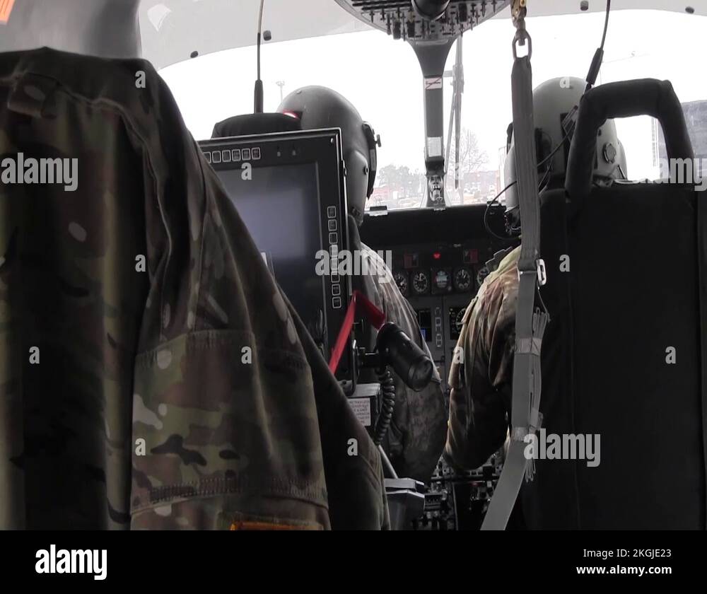 CH-47 Chinook pilots carry out pre-flight cockpit control panel checks ...