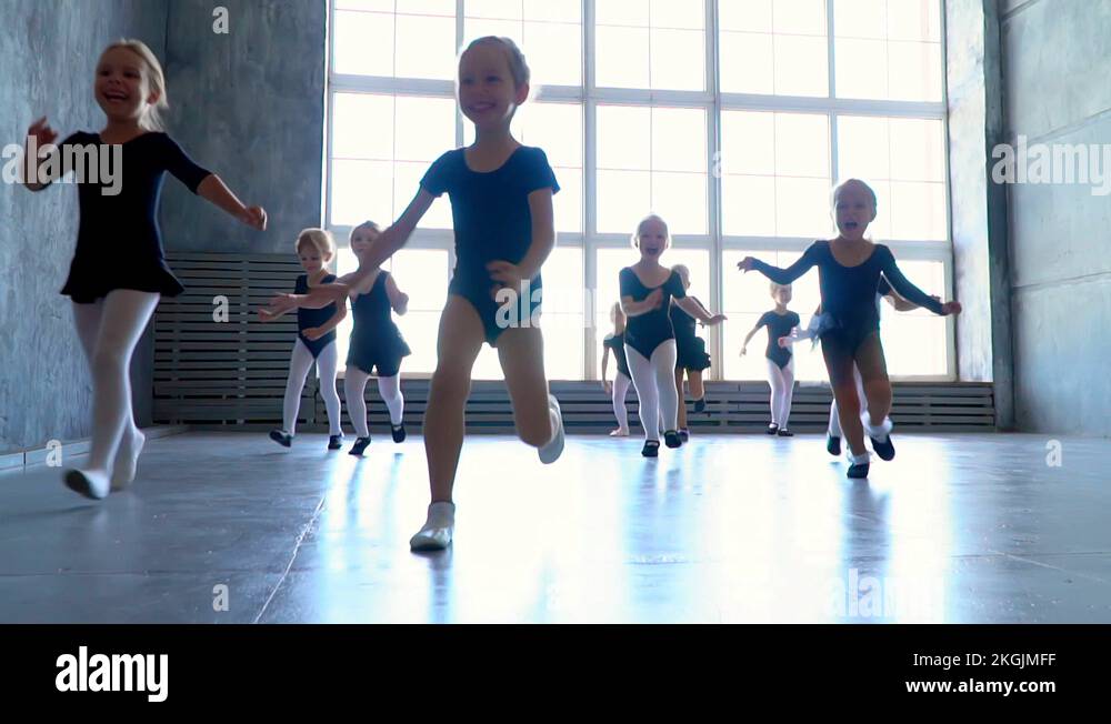 Little girls dance ballet. Children in ballet class.Little ballerinas ...