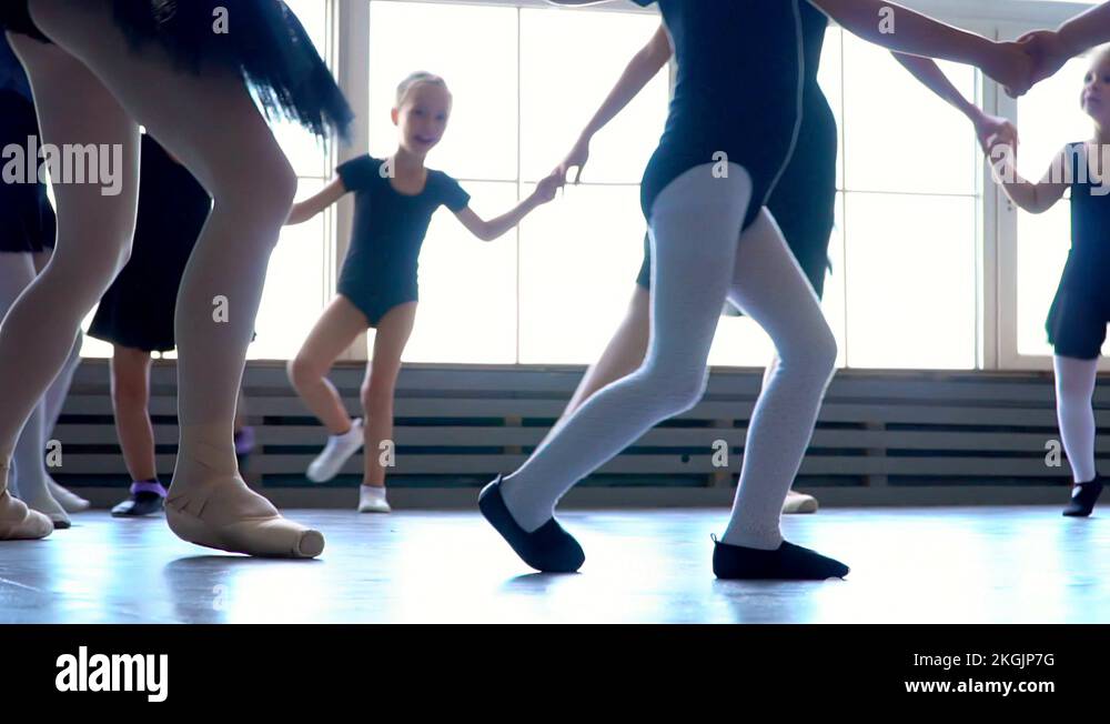 Little girls dance ballet. Children in ballet class.Little ballerinas ...