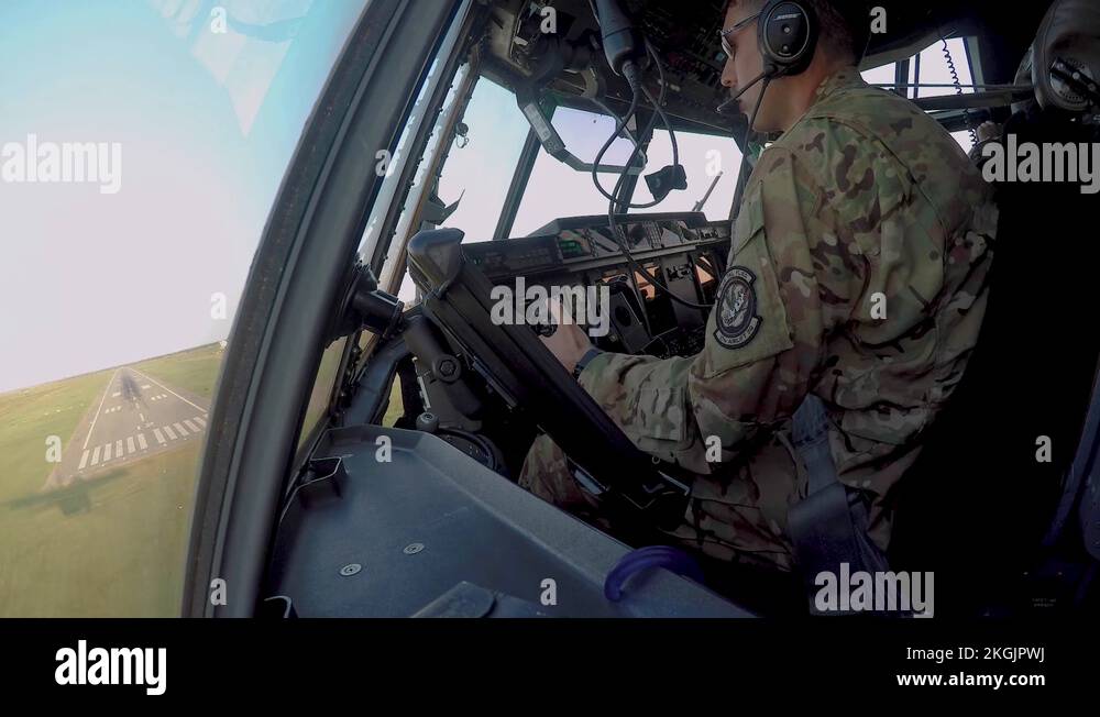 External side view of C-130 Hercules pilot approaching runway Stock ...