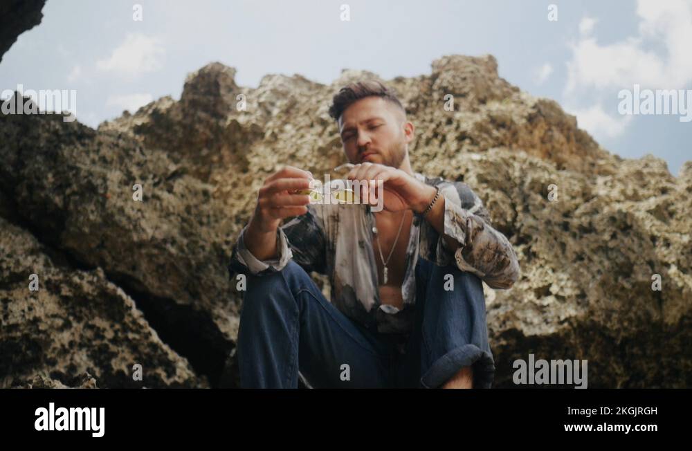 Man sitting on rock thinking Stock Videos & Footage - HD and 4K Video ...