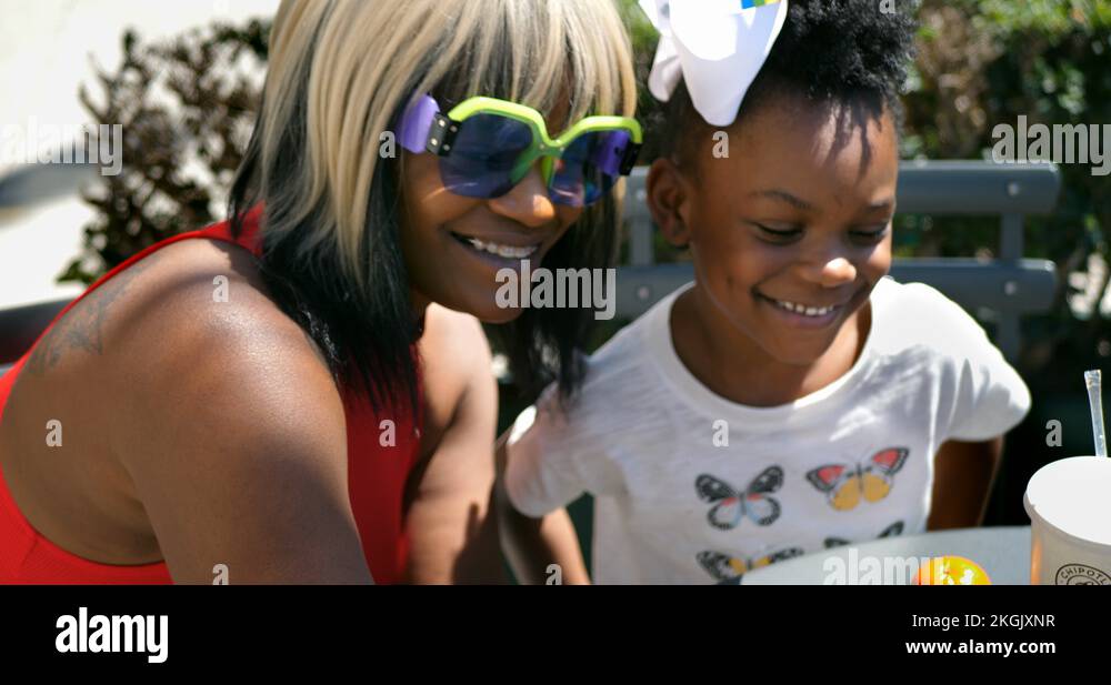 Black Afro-American family with kids enjoy famous Rodeo Drive in Los ...