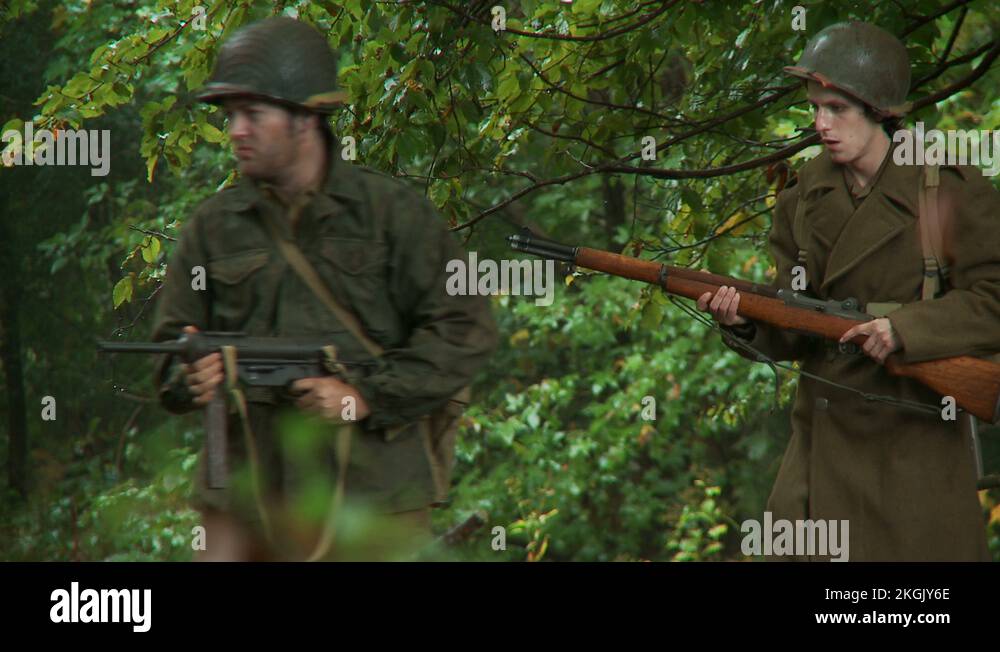 WW2 U.S. Army G.I. Soldiers in Woods with Submachine Gun and M-1 Garand ...