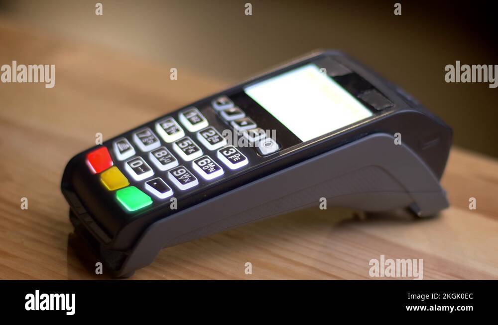 Closeup shoot of a payment terminal being used for payment by credit ...