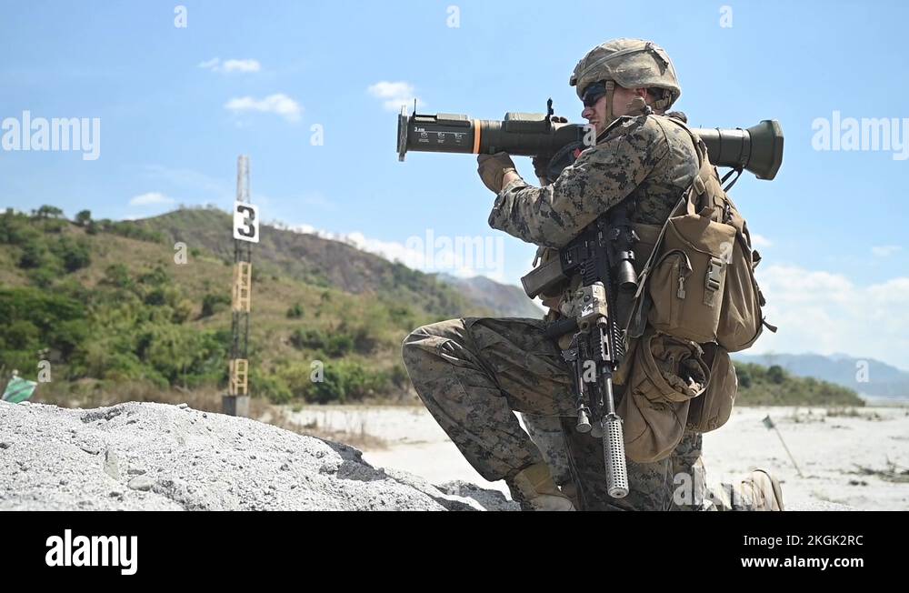 Soldier firing rocket launcher from beach during exercise Balikatan ...