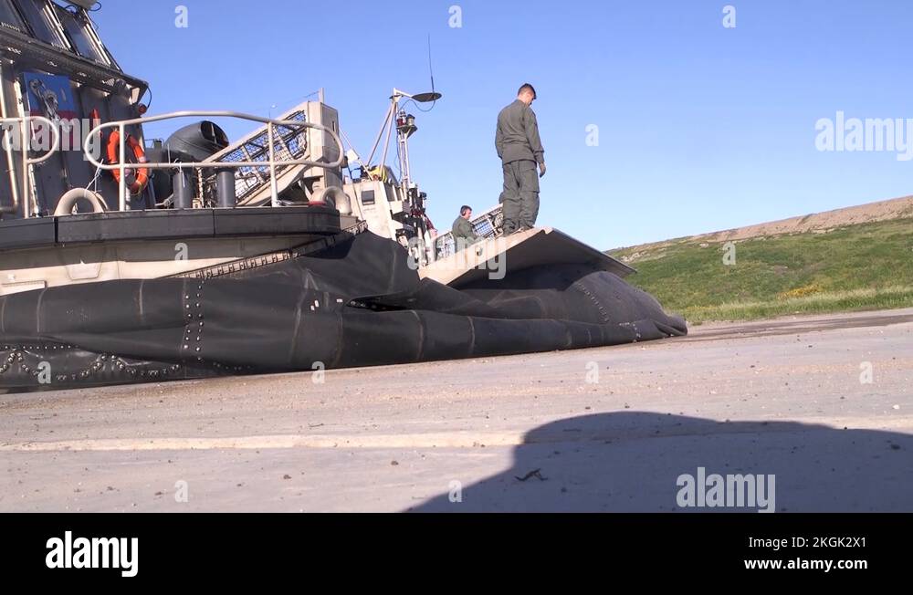 Bow ramp being lowered on landing craft air cushion Stock Video Footage ...