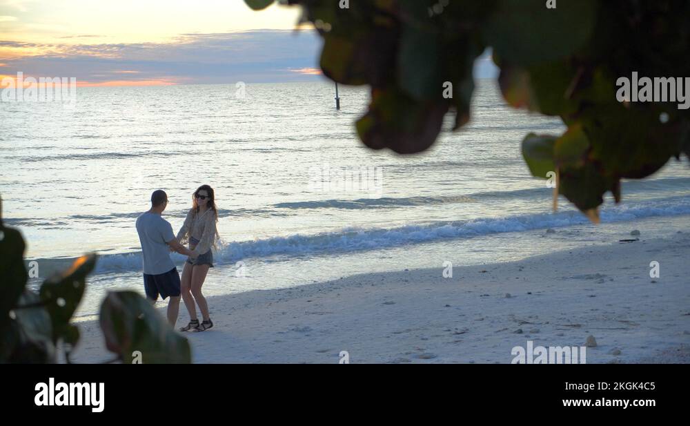 Beautiful woman dances on beach Stock Videos & Footage - HD and 4K Video Clips - Alamy