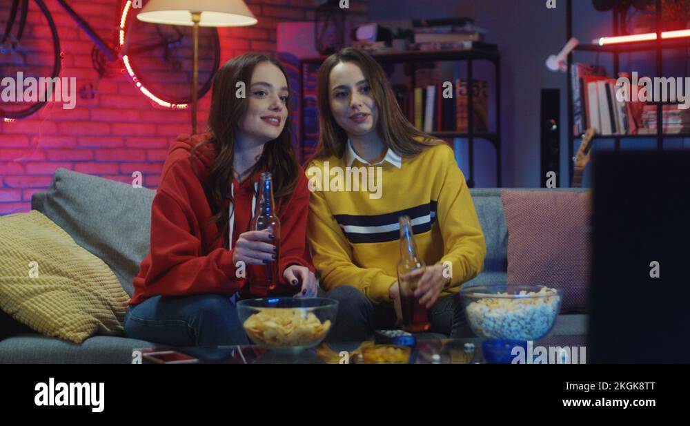 Two girls watching tv together Stock Videos & Footage - HD and 4K Video ...