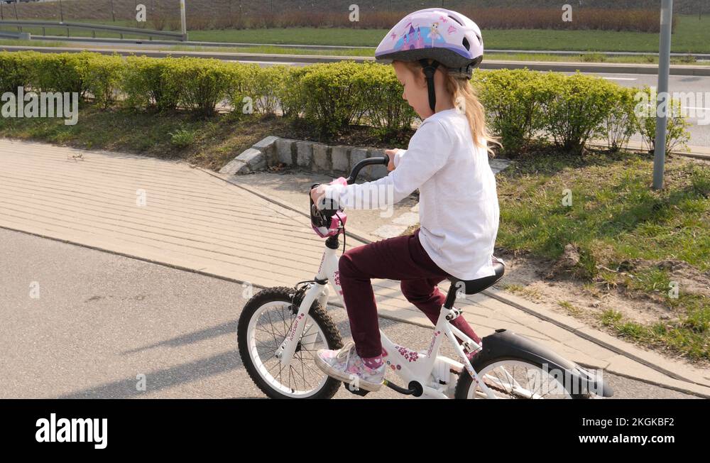 Kid cycle street Stock Videos & Footage - HD and 4K Video Clips - Alamy