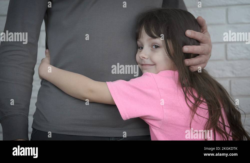 Child hugging father Stock Videos & Footage - HD and 4K Video Clips - Alamy