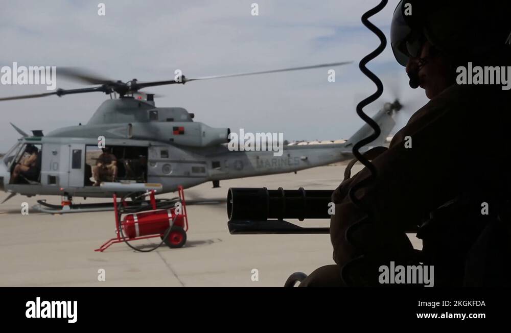 Door gunner looking out from UH-1Y Venom during take off Stock Video ...