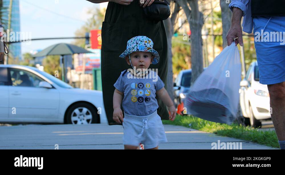 Cute Baby Boy Walking With His Mother On The Street Stock Video Footage ...