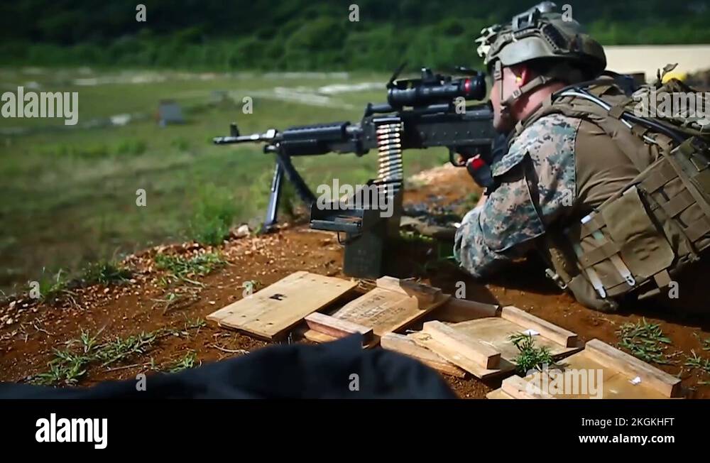 Soldier firing assault rifle in a target shooting range Stock Video ...
