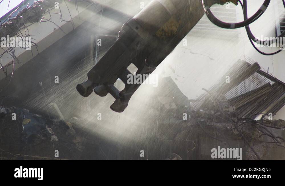Demolition Arm Breaking Down Building Pieces Stock Video Footage - Alamy