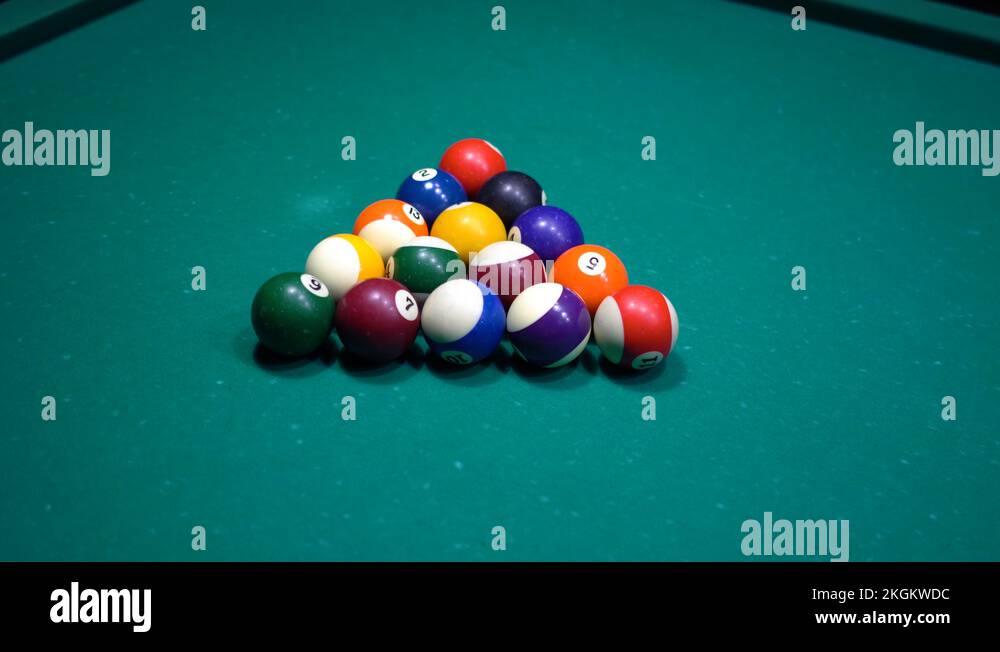 American pool, swimming pool for nine balls. The boy plays billiards ...