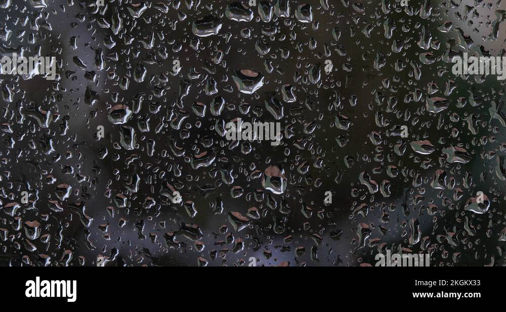 Rain dripping on the windshield of the car, Slow motion 4K Stock Video ...