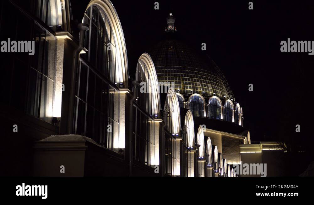Facade of a nice building. Windows and the dome are beautifully lit ...